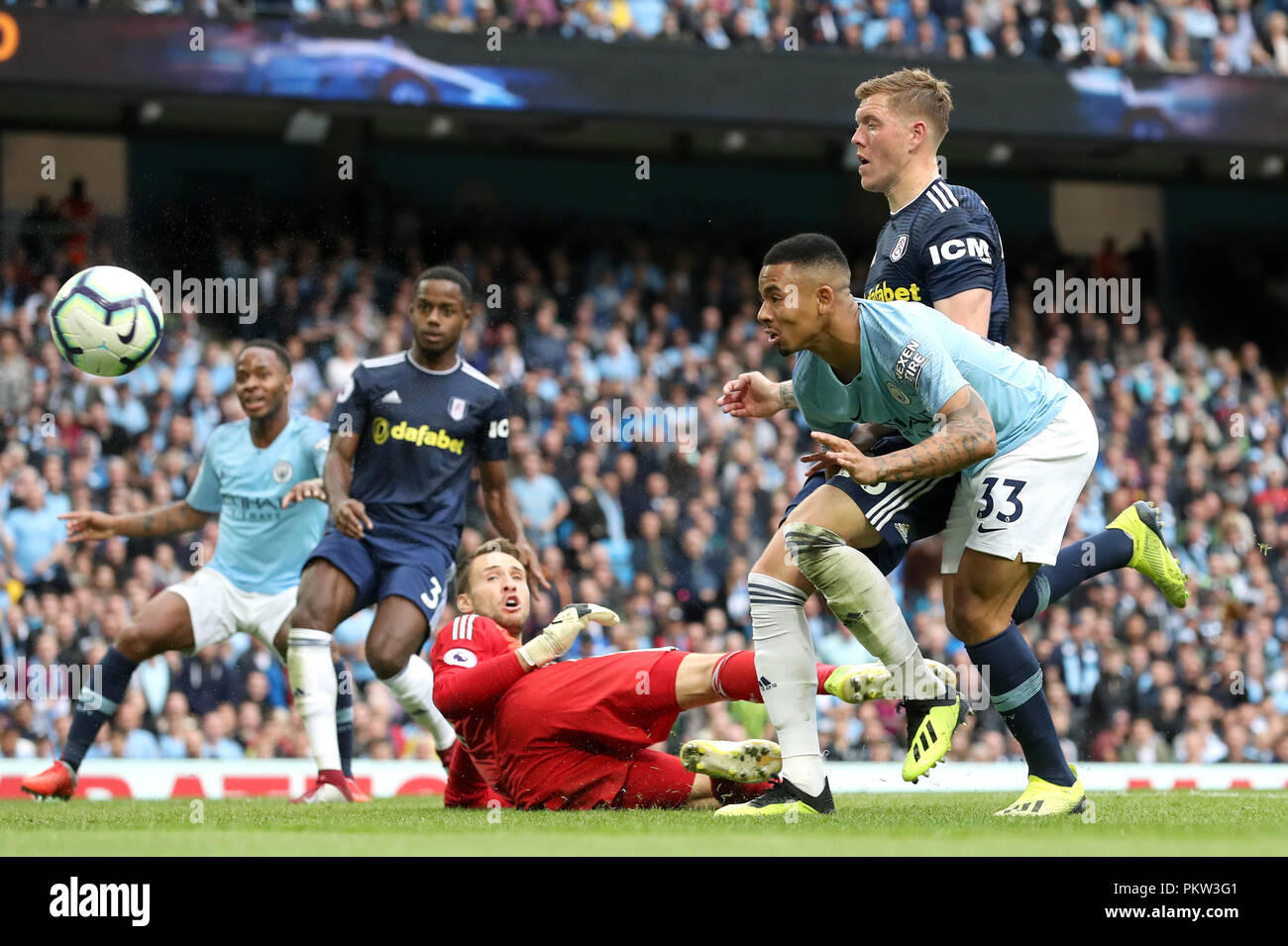 Manchester City's Gabriel Jesus (right) has a shot on goal but misses ...