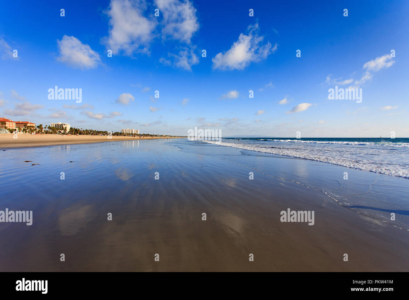 Sky Reflection in Beach Ocean Water Stock Photo - Alamy