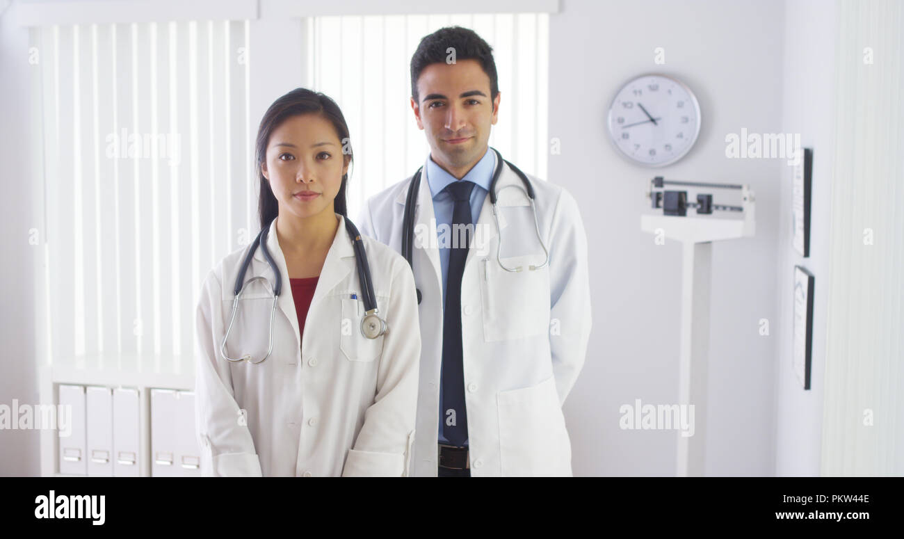 Cute chinese doctor standing in hi-res stock photography and images - Alamy