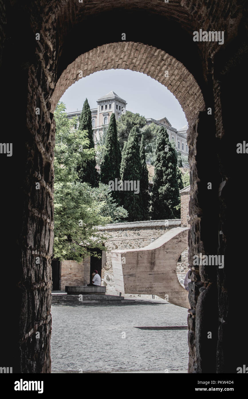 View through the arch gate for Alcazaba of Toledo, Spain Stock Photo ...