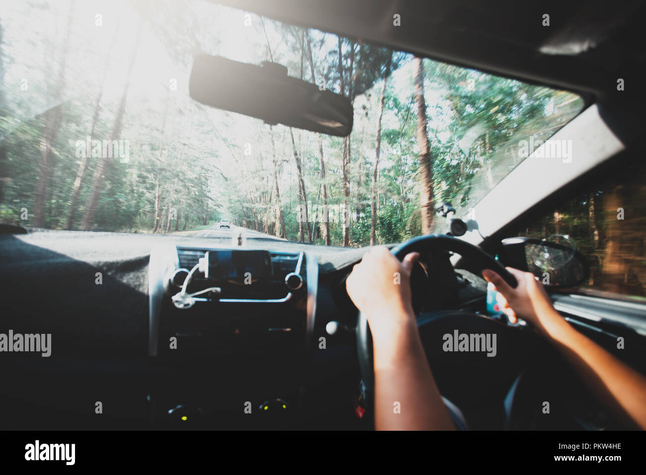 View inside a car of the man driving on the road Stock Photo - Alamy