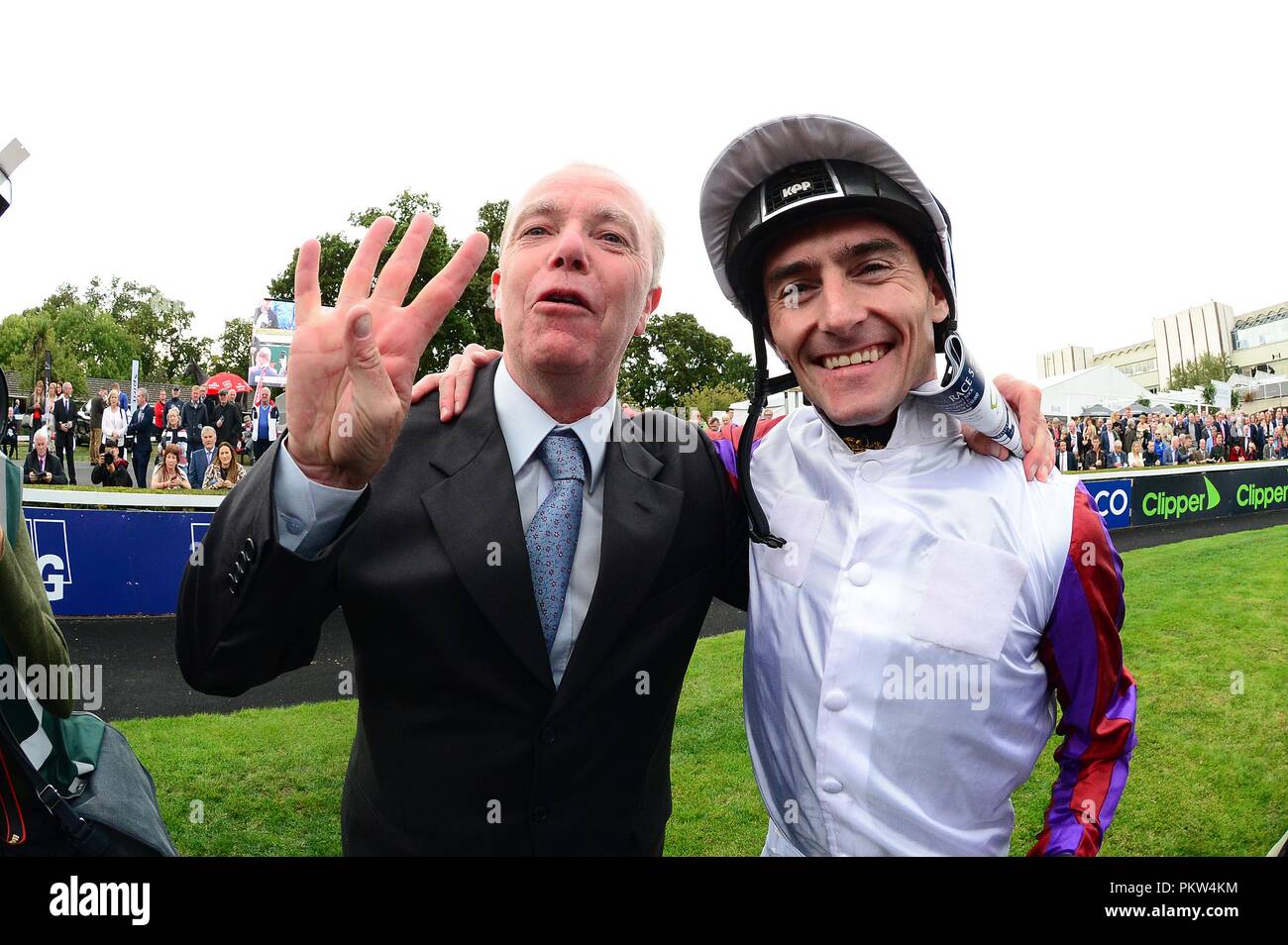 Daniel Tudhope (right) celebrates winning the Coolmore Fastnet Rock ...