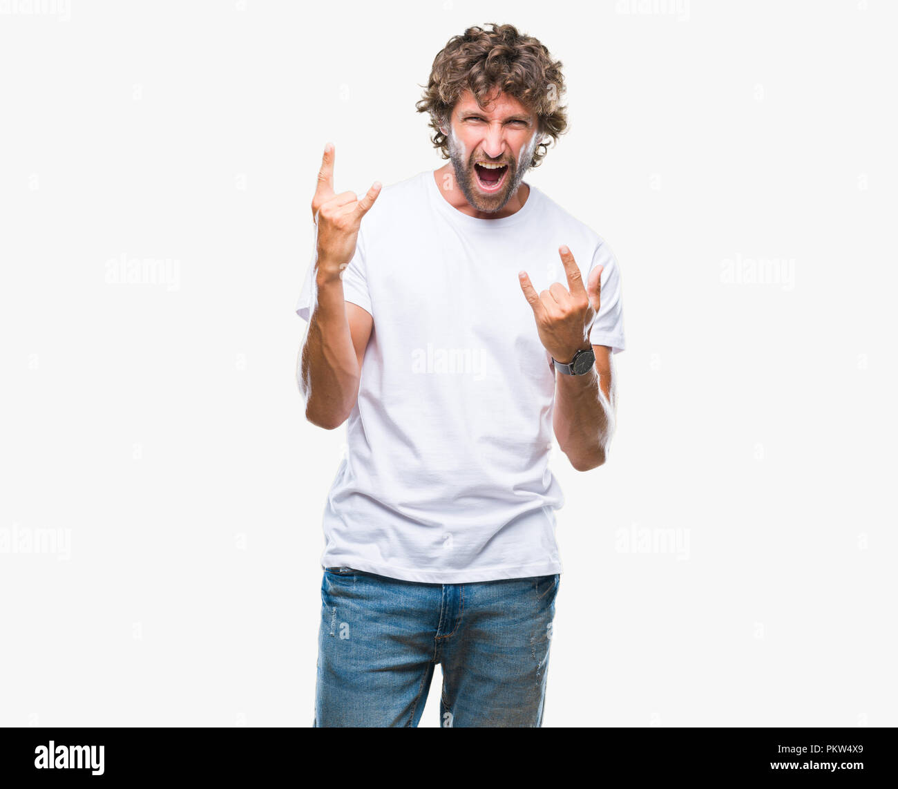 Handsome hispanic model man over isolated background shouting with ...