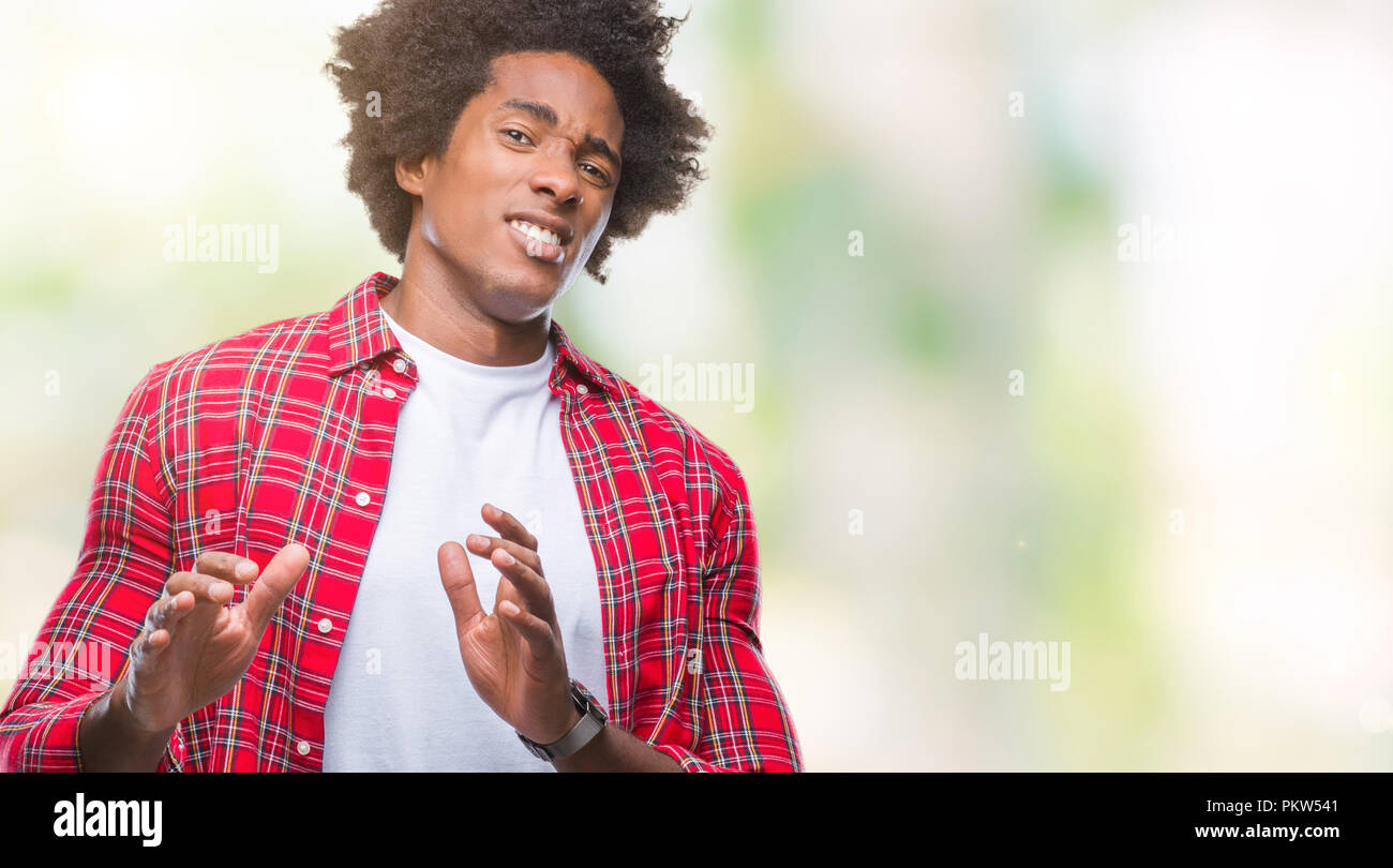 Afro american man over isolated background disgusted expression ...