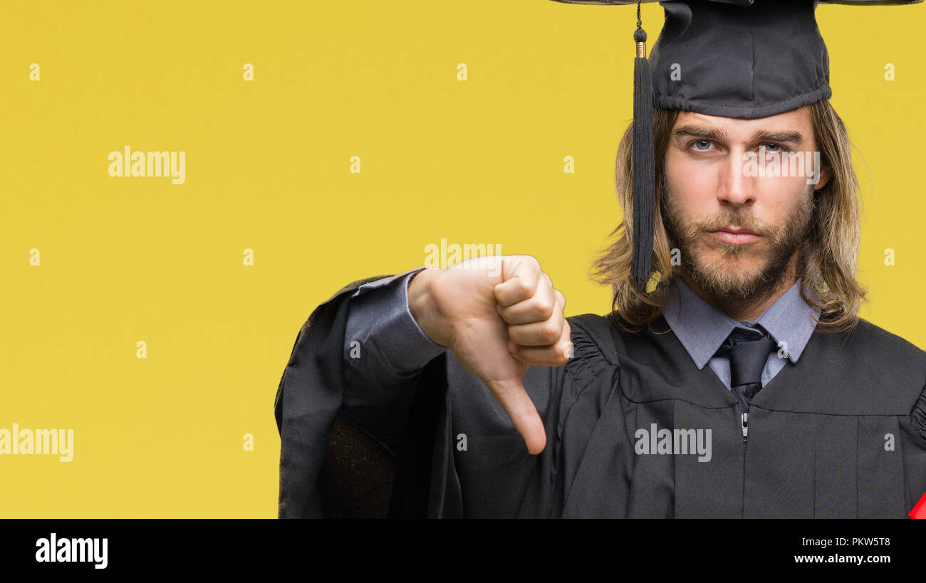 Sad college graduate holding diploma hi-res stock photography and ...