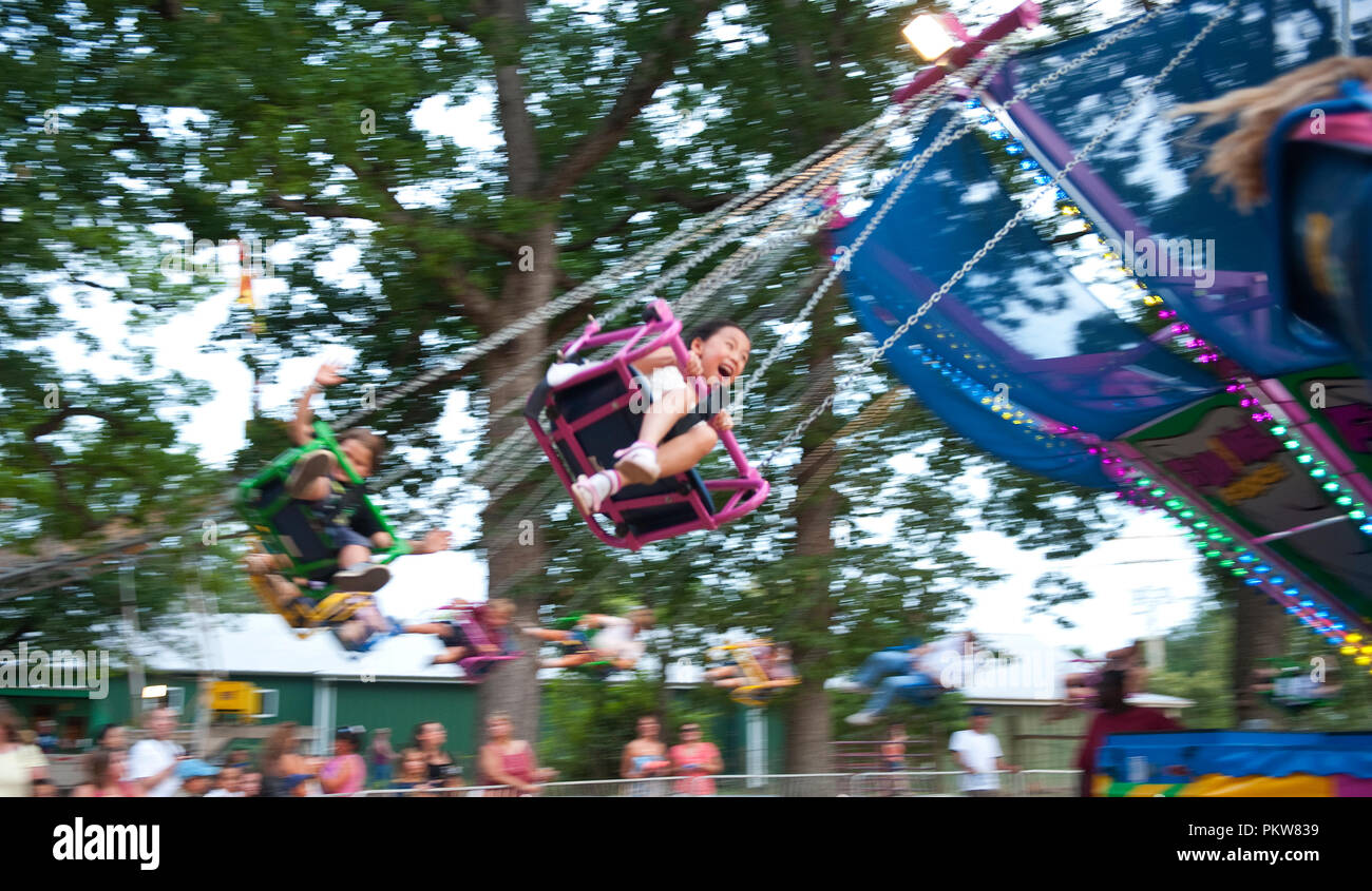 Rides and games on the mid-way are always a big crowd draw at the the ...