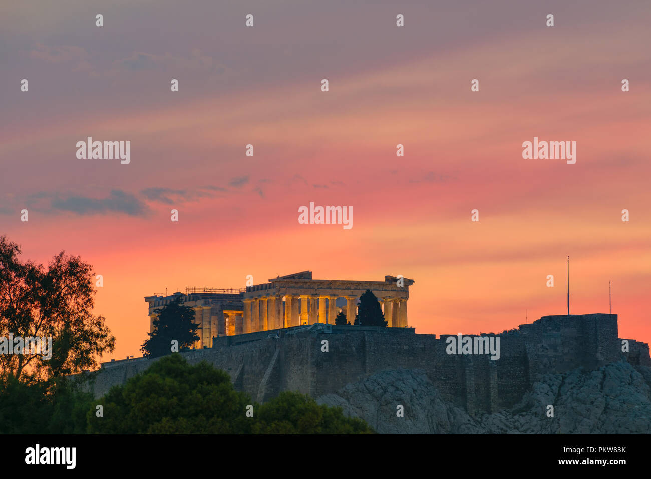 Acropolis, Parthenon view from Panathenaic stadium (Kallimarmaro) at sunset, with colorful sky ...