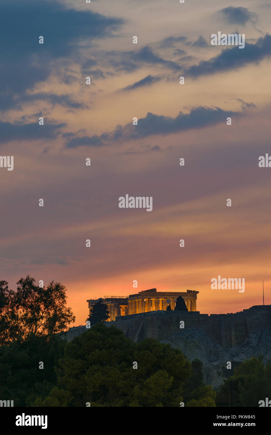 Acropolis, Parthenon view from Panathenaic stadium (Kallimarmaro) at sunset, with colorful sky ...