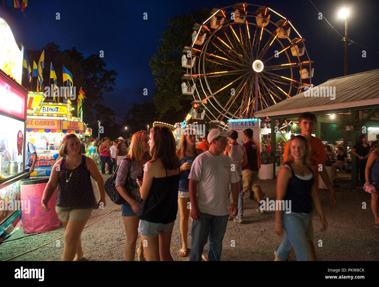 Rides and games on the mid-way are always a big crowd draw at the the ...