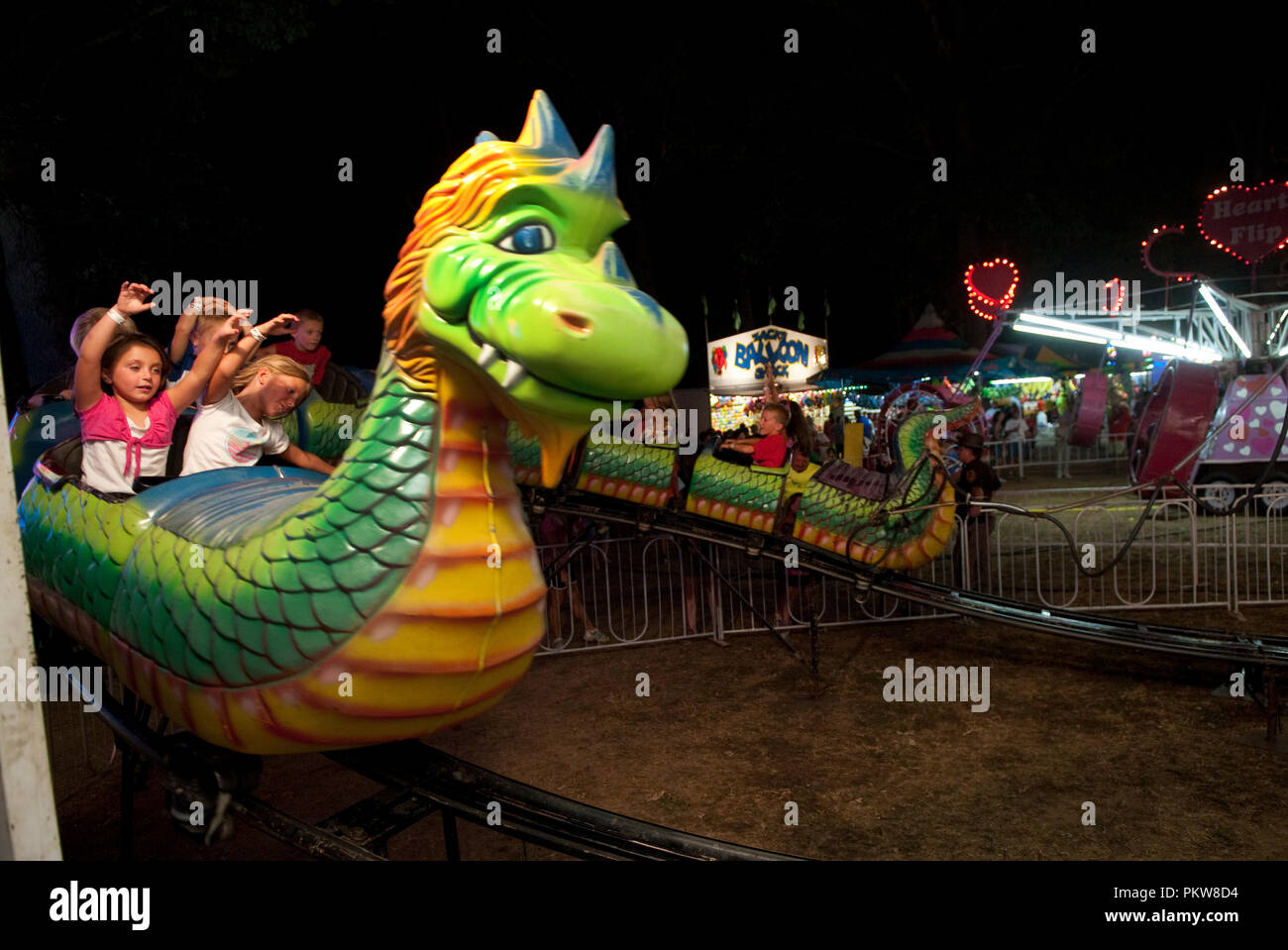 Rides and games on the mid-way are always a big crowd draw at the the ...