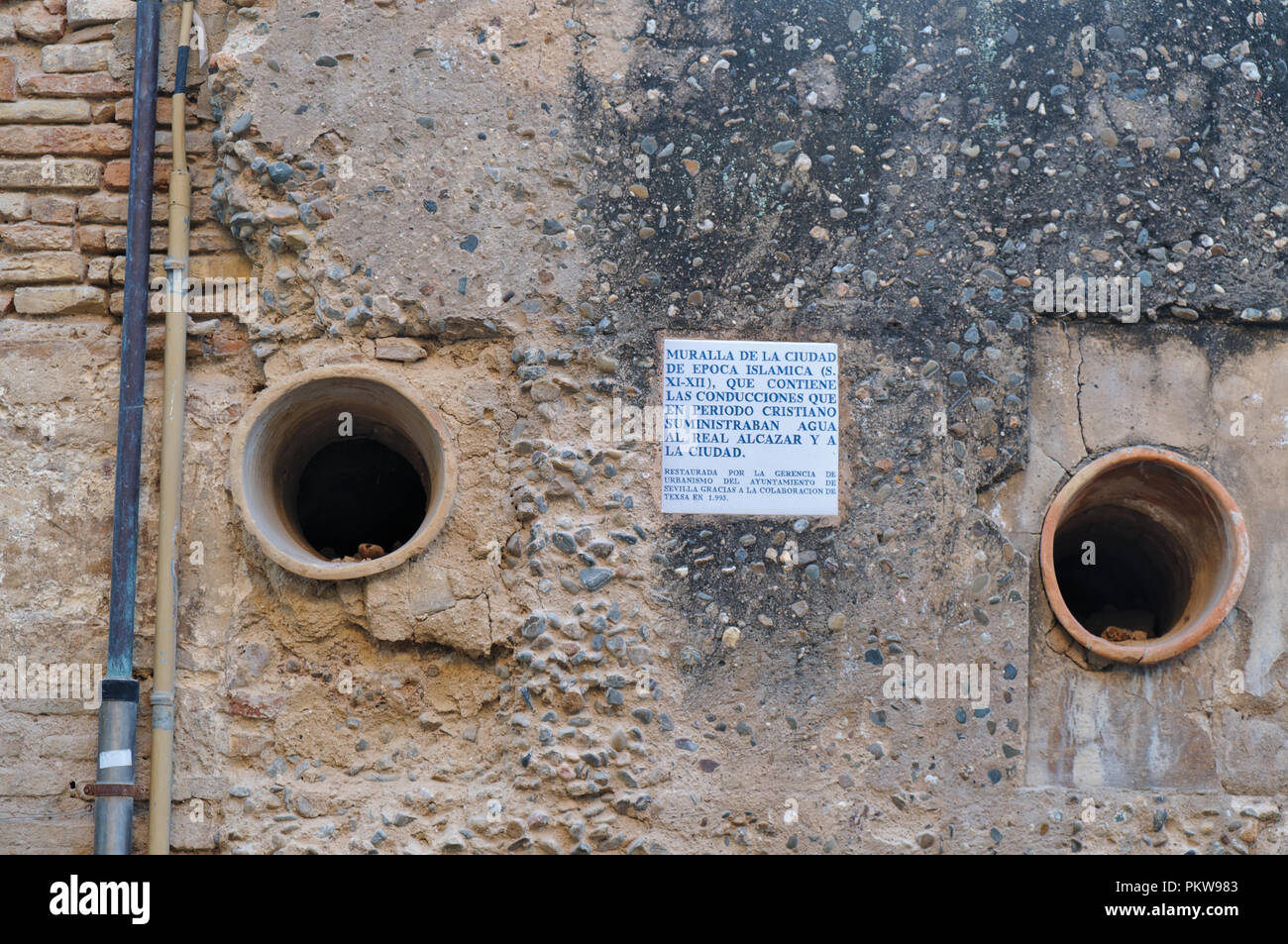 Ancient water pipes inside the castle walls in Seville, Spain Stock ...