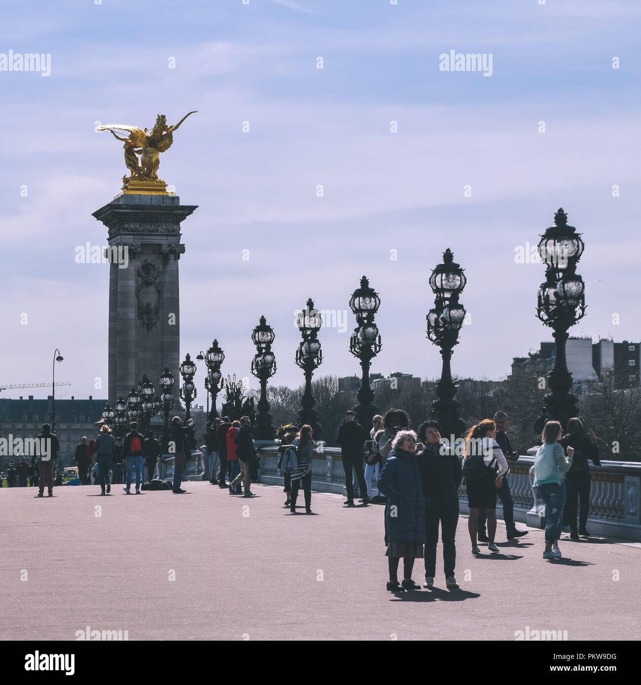 Tourists visiting Alexandre III Bridge Stock Photo - Alamy