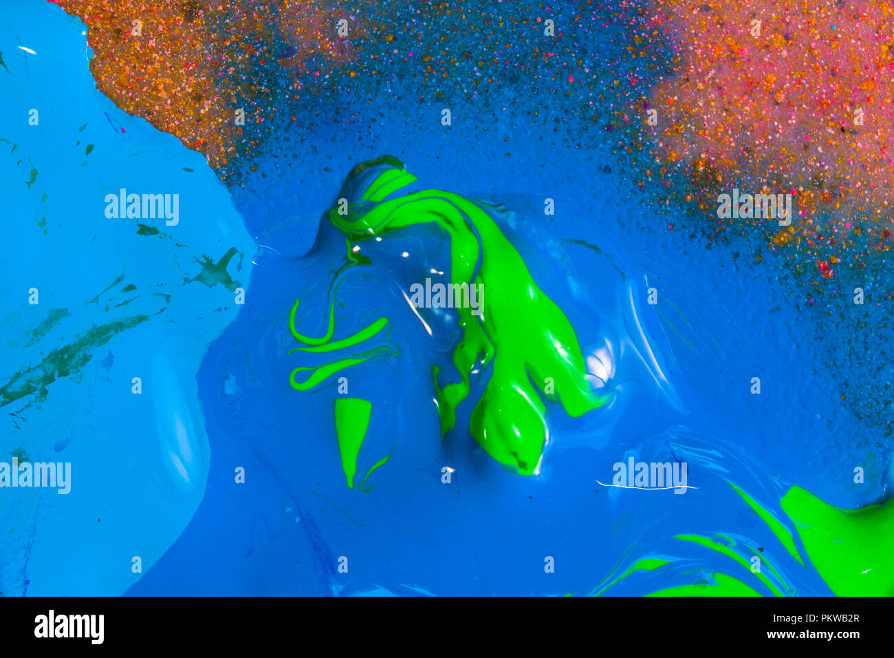 colorful of screen printing ink dropped on the ground made an abstract ...