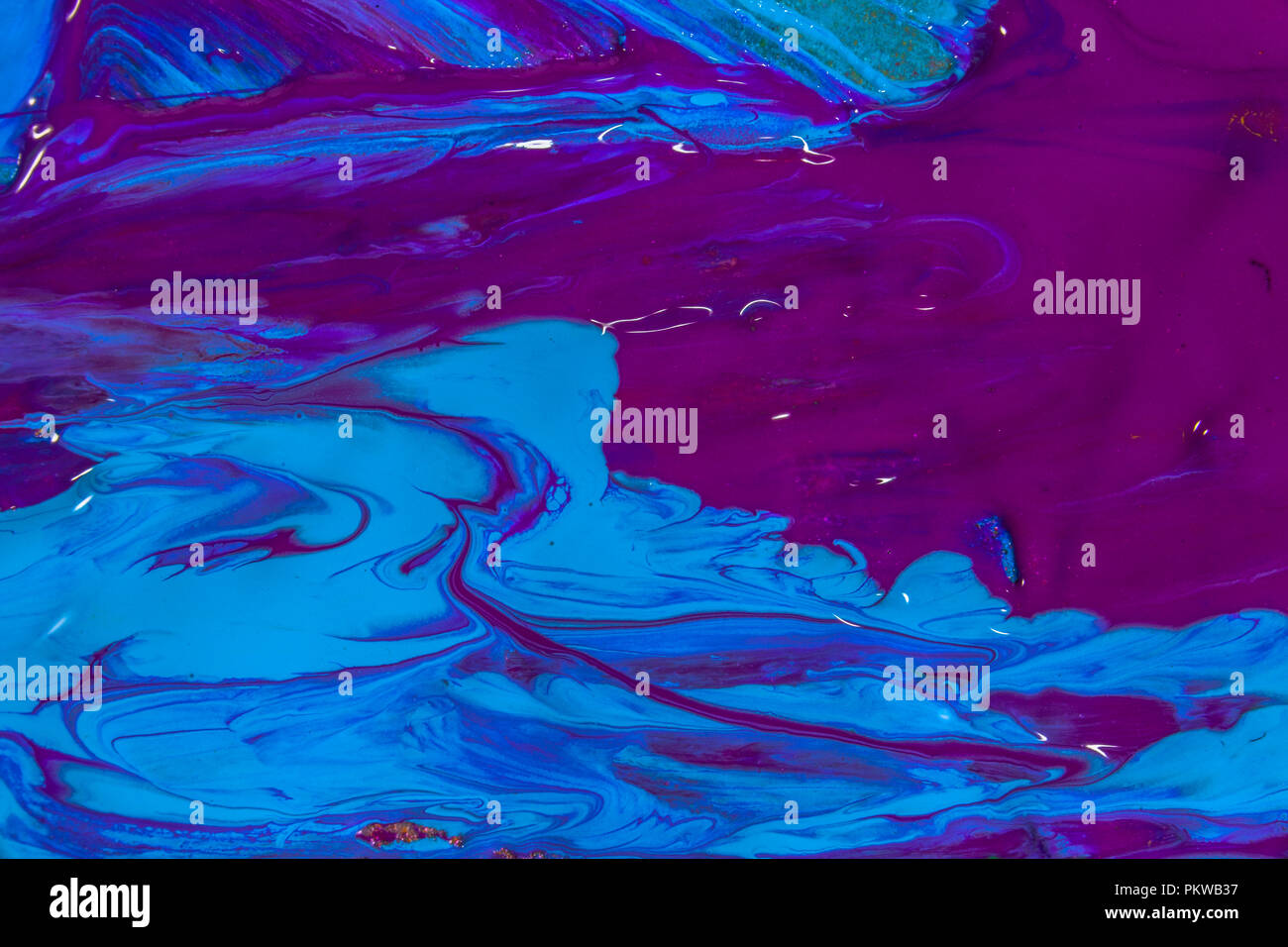 colorful of screen printing ink dropped on the ground made an abstract ...