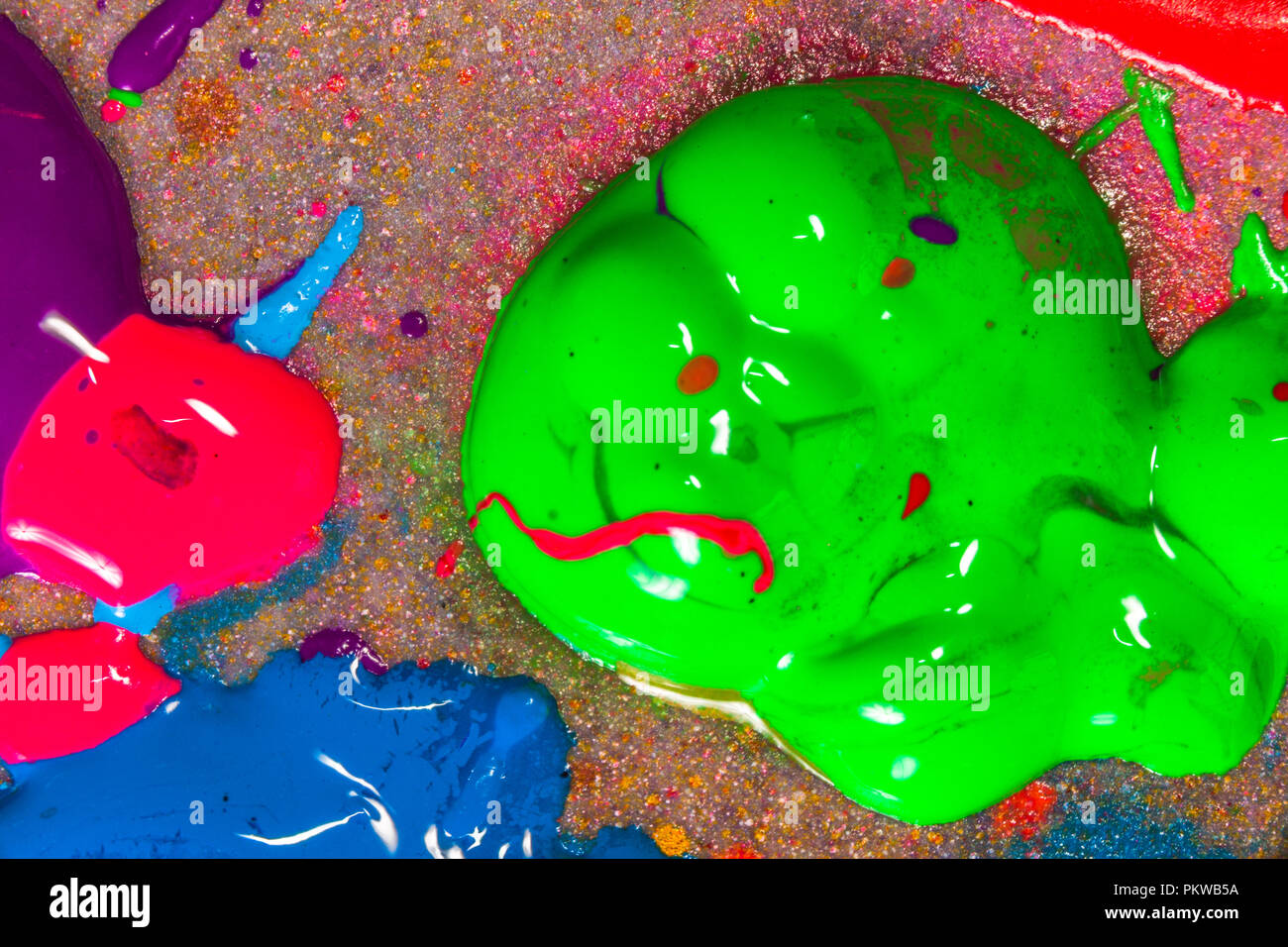 colorful of screen printing ink dropped on the ground made an abstract ...