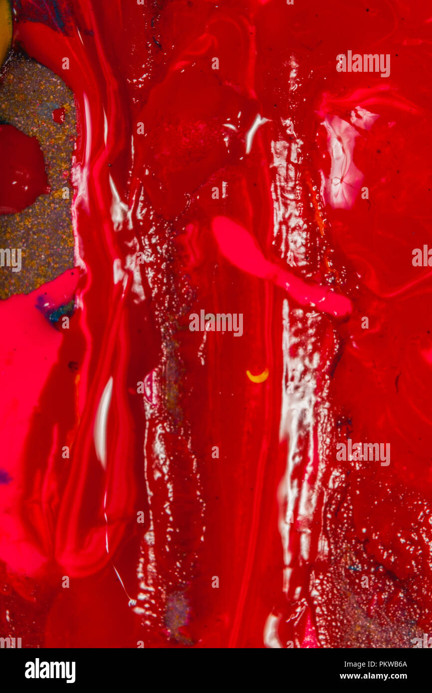 colorful of screen printing ink dropped on the ground made an abstract ...