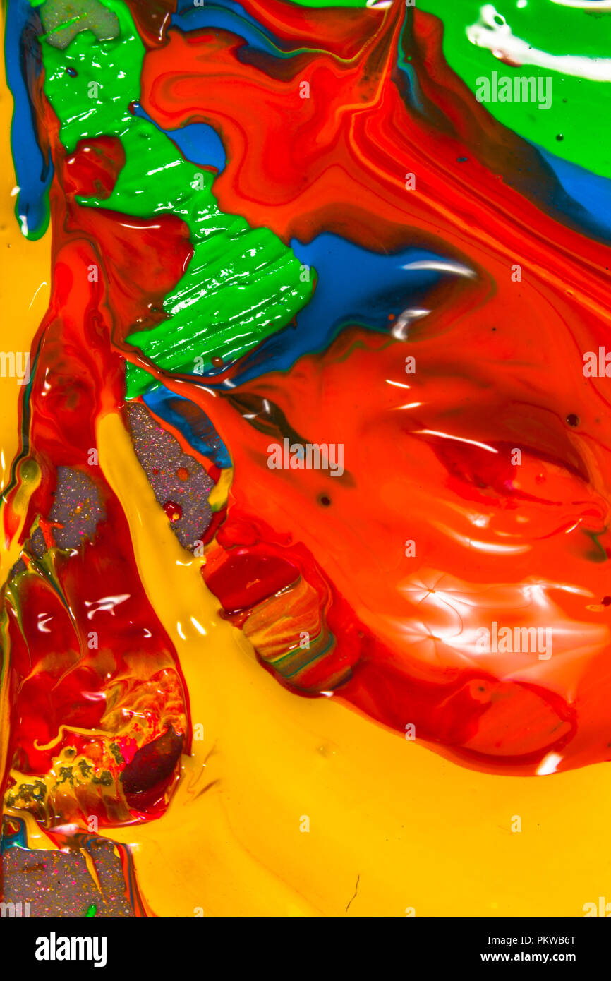 colorful of screen printing ink dropped on the ground made an abstract ...