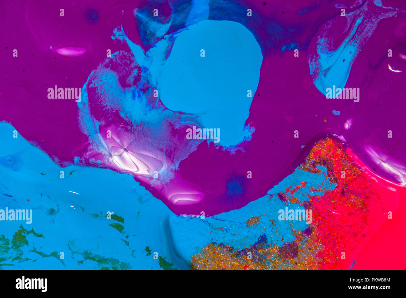 colorful of screen printing ink dropped on the ground made an abstract ...