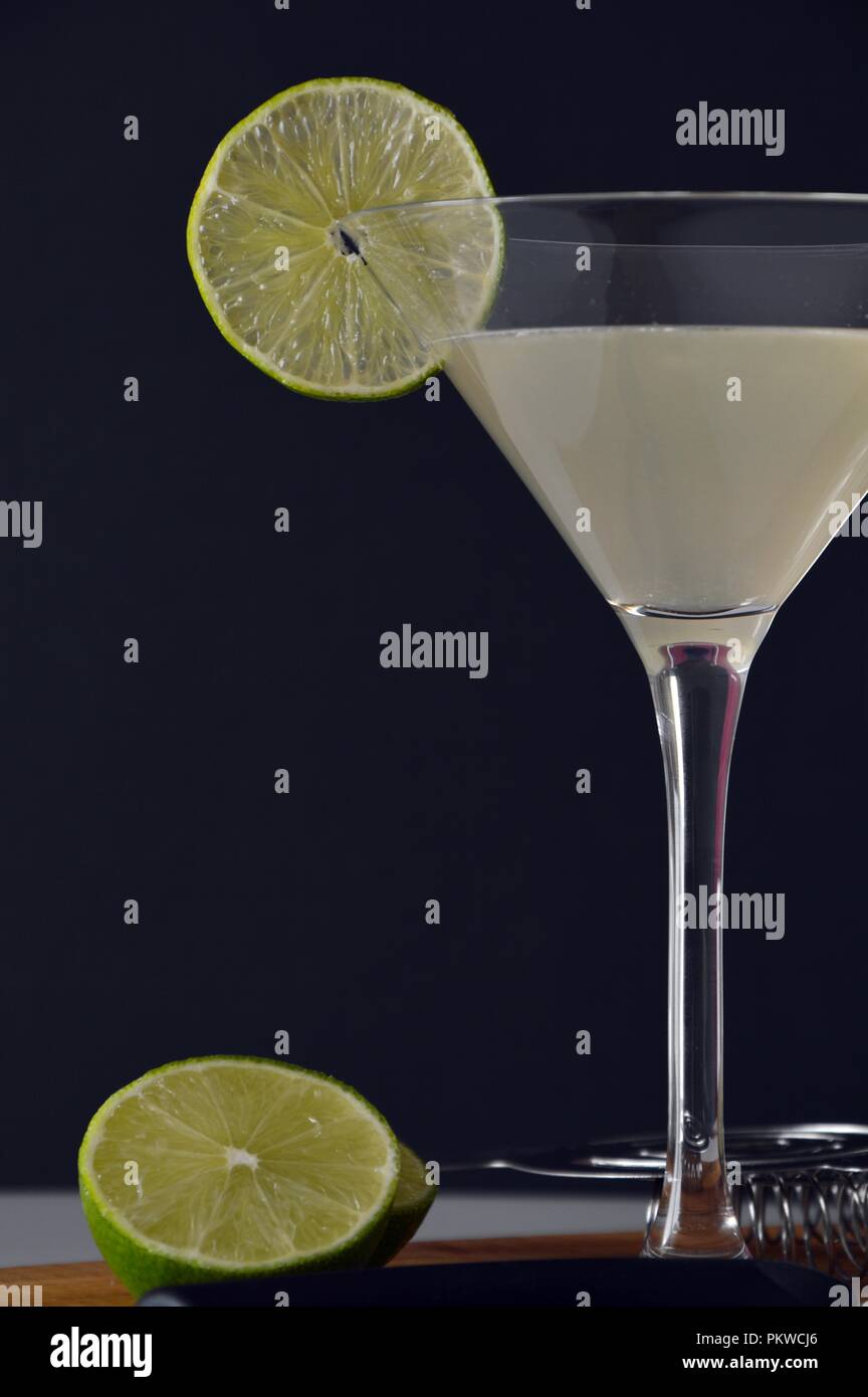 glass of daiquiri cocktail with lime and rum Stock Photo - Alamy