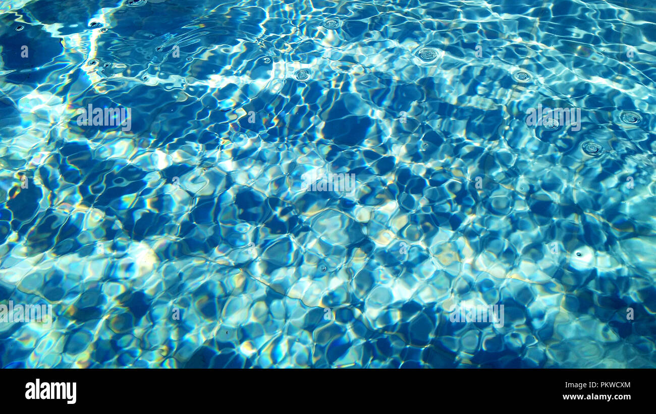 Blue pool water Stock Photo - Alamy