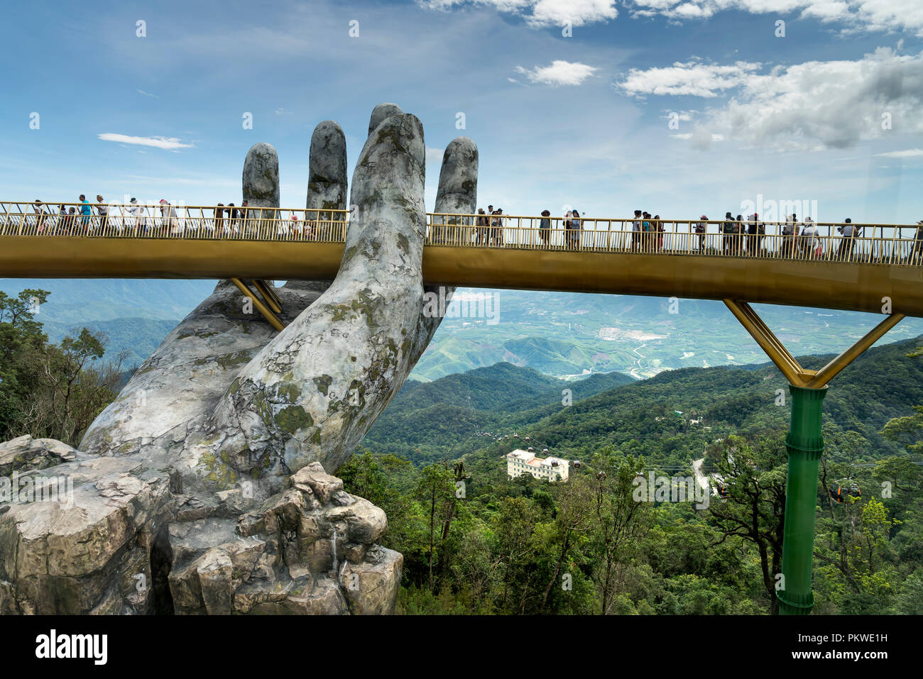 The Golden Bridge is lifted by two giant hands in the tourist resort on ...
