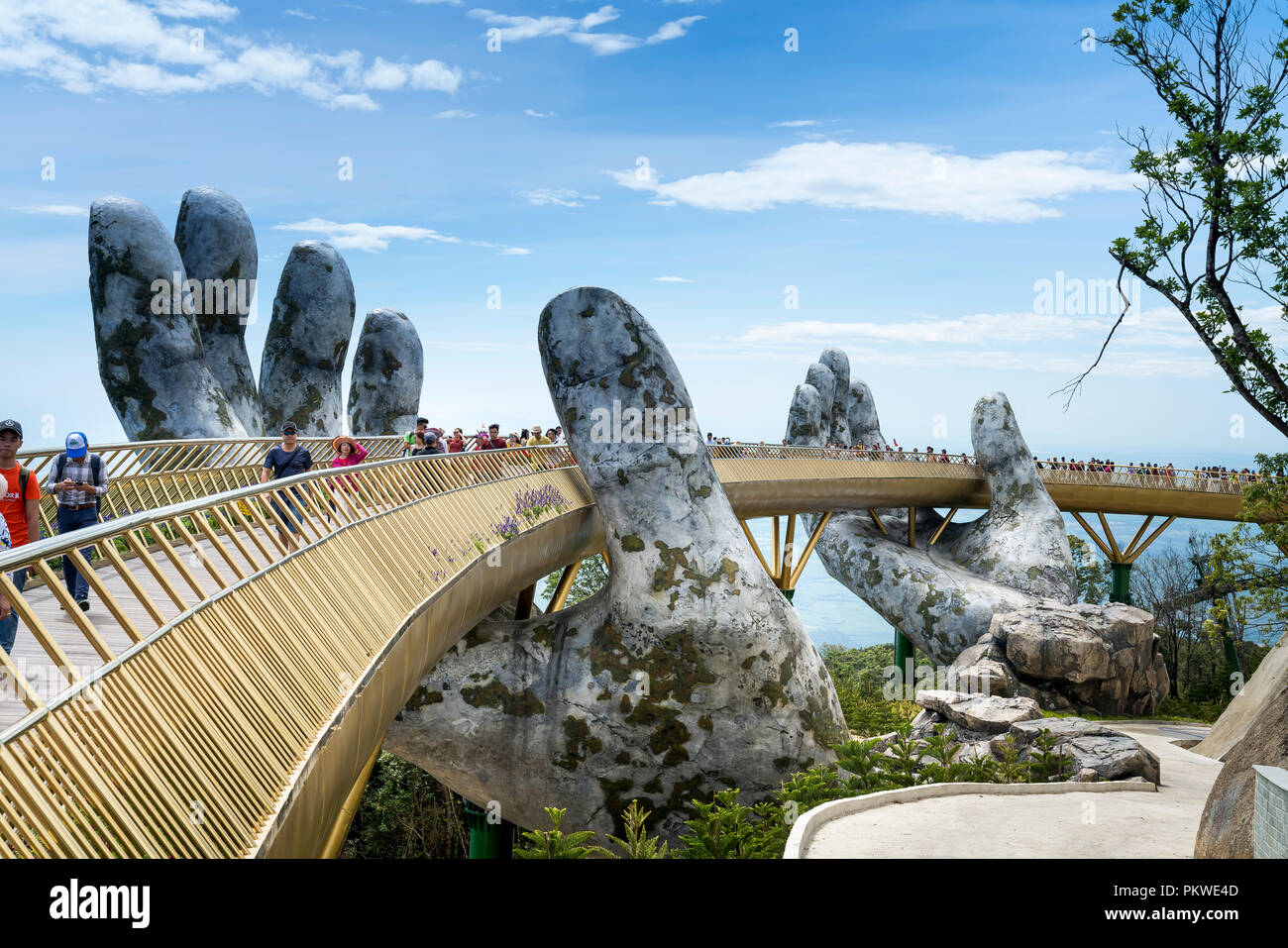 The Golden Bridge is lifted by two giant hands in the tourist resort on ...