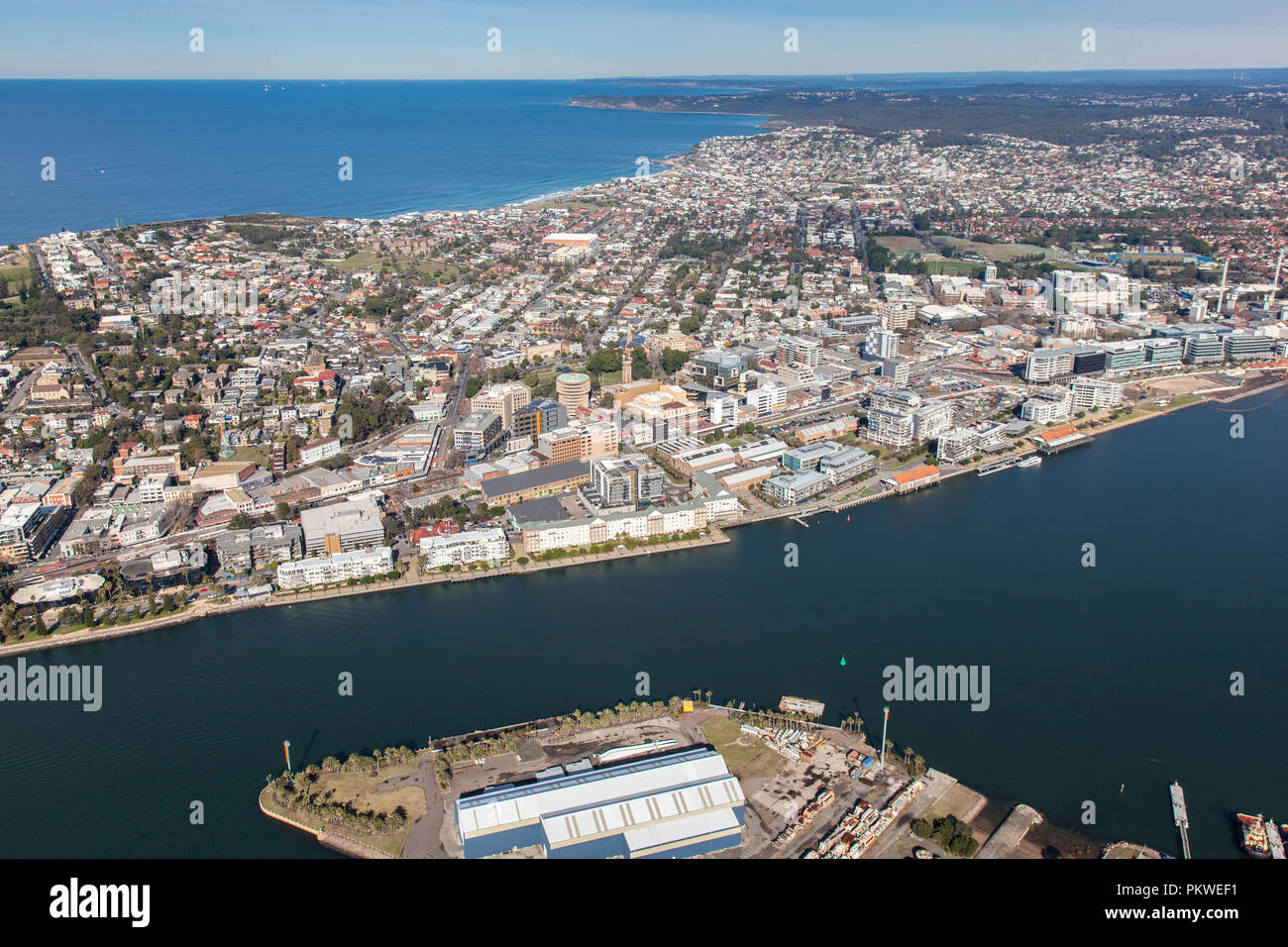 Aerial view of Newcastle harbour and city looking south towards the ...