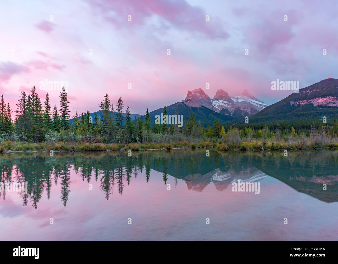 Three Sisters Reflection at Canmore Canada Stock Photo - Alamy
