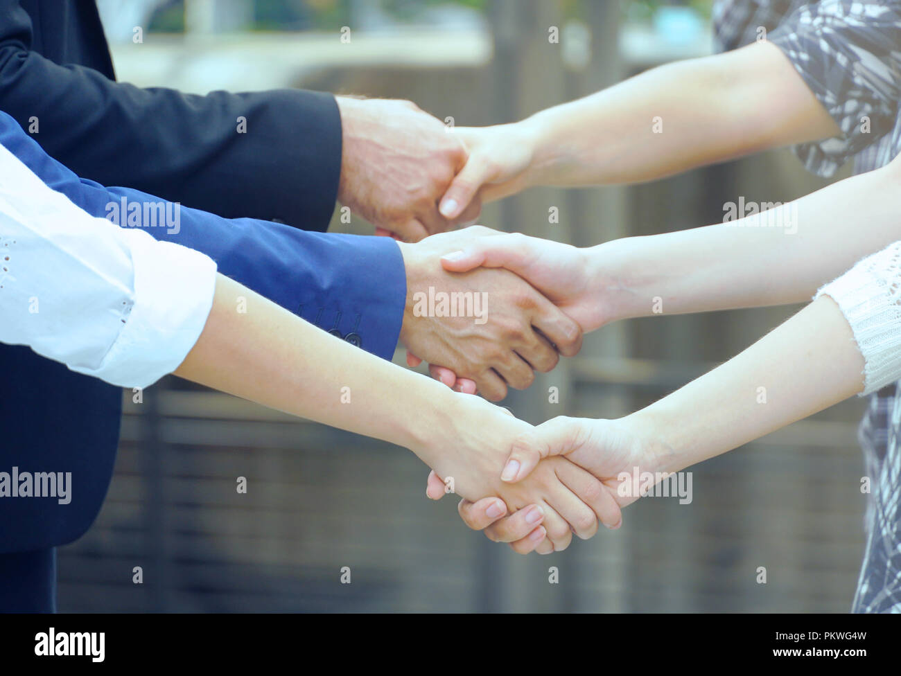 Business teamwork shaking hands Stock Photo - Alamy