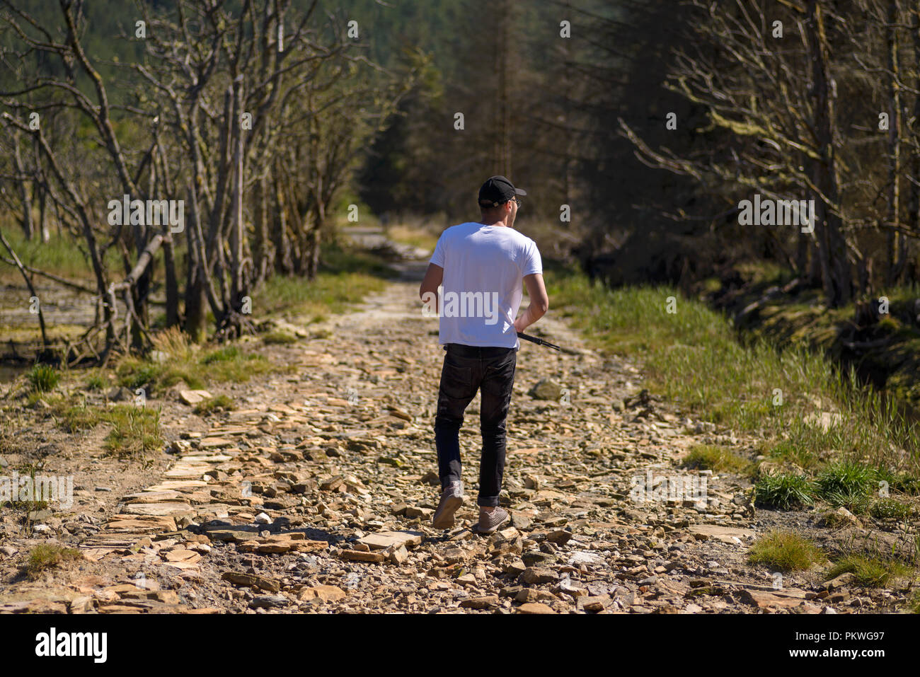 man in the forest Stock Photo - Alamy