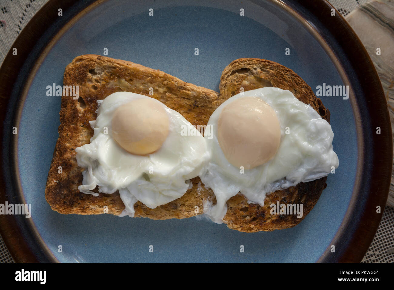 Poached eggs on toast hi-res stock photography and images - Alamy