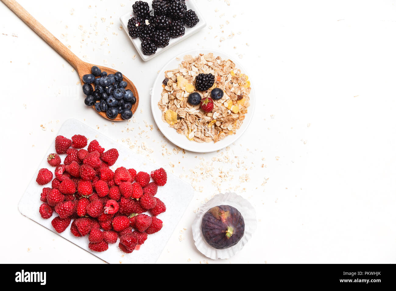 bowl of corn flakes with berries on white background Stock Photo - Alamy