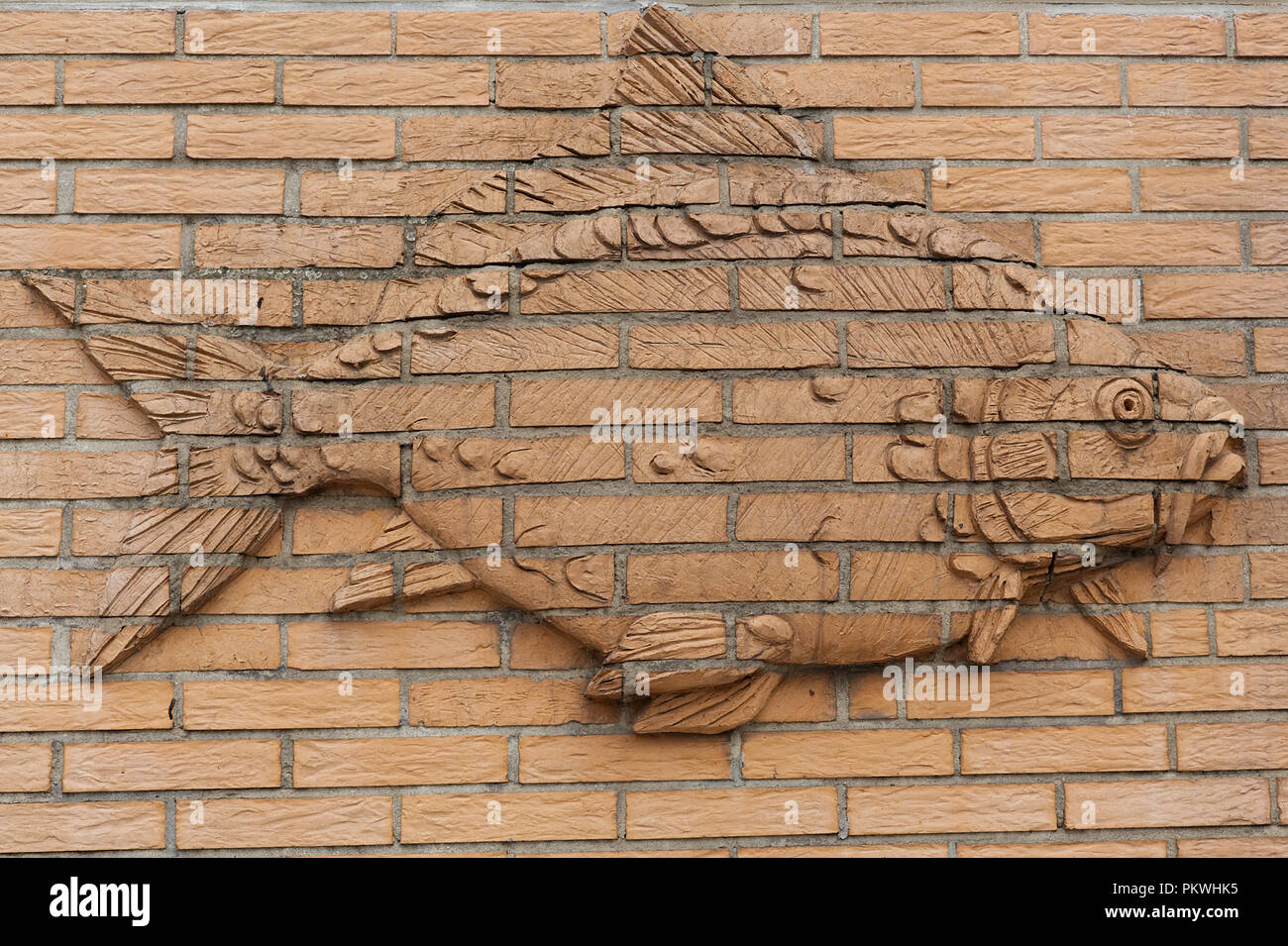 Fish made from red bricks Stock Photo - Alamy