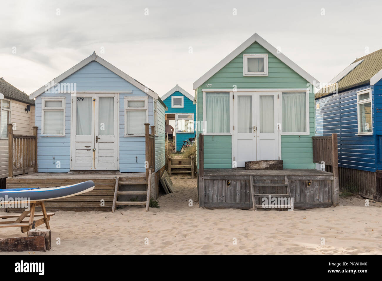 The colourful beach huts at Mudeford Sandbank near Christchurch in ...