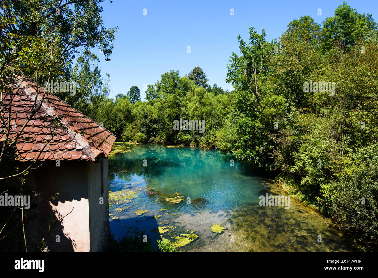 Krupaj vrelo a natural water well in eastern Serbia Stock Photo - Alamy
