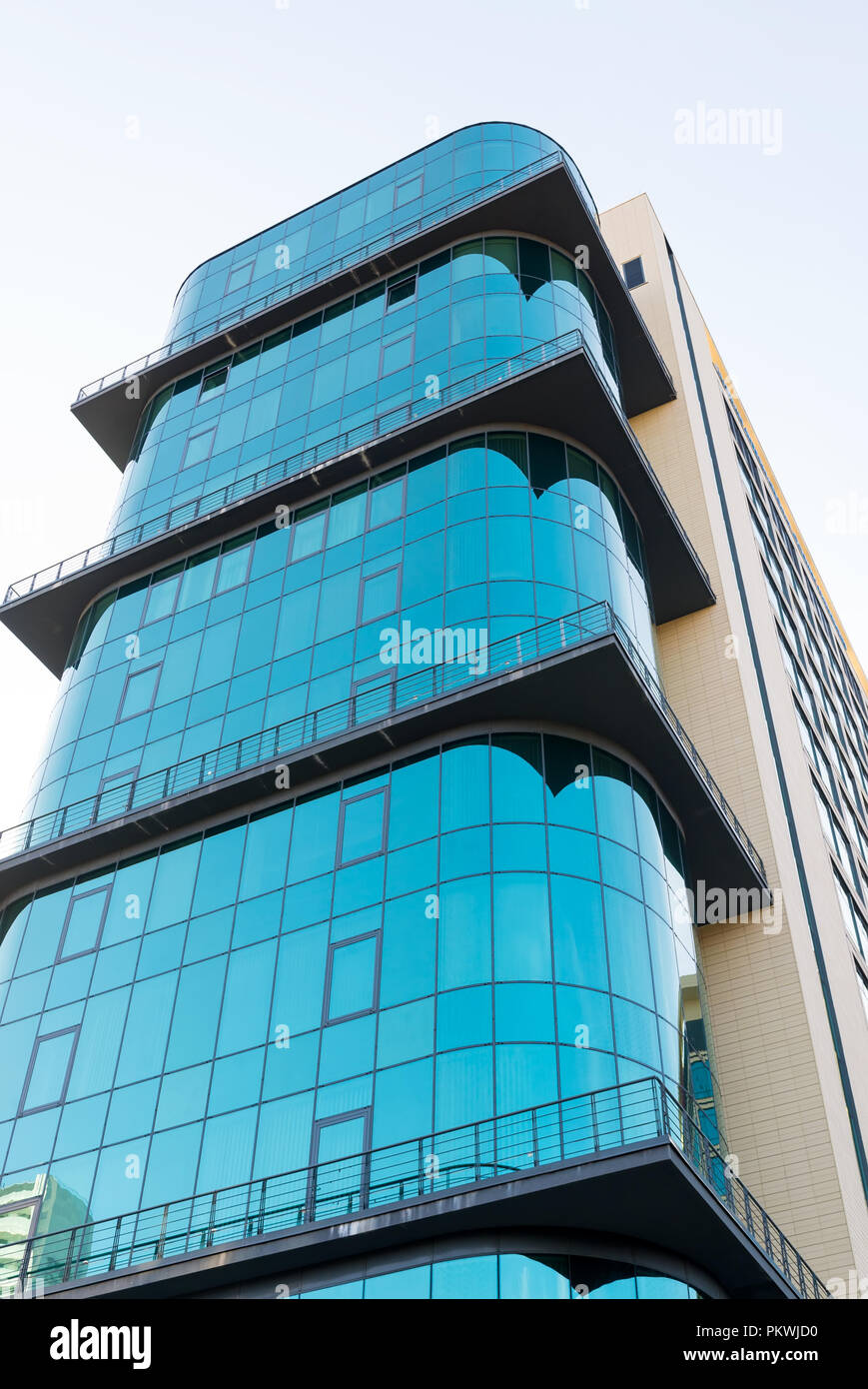 Modern minimalistic architecture with a lot of square glass windows and ...