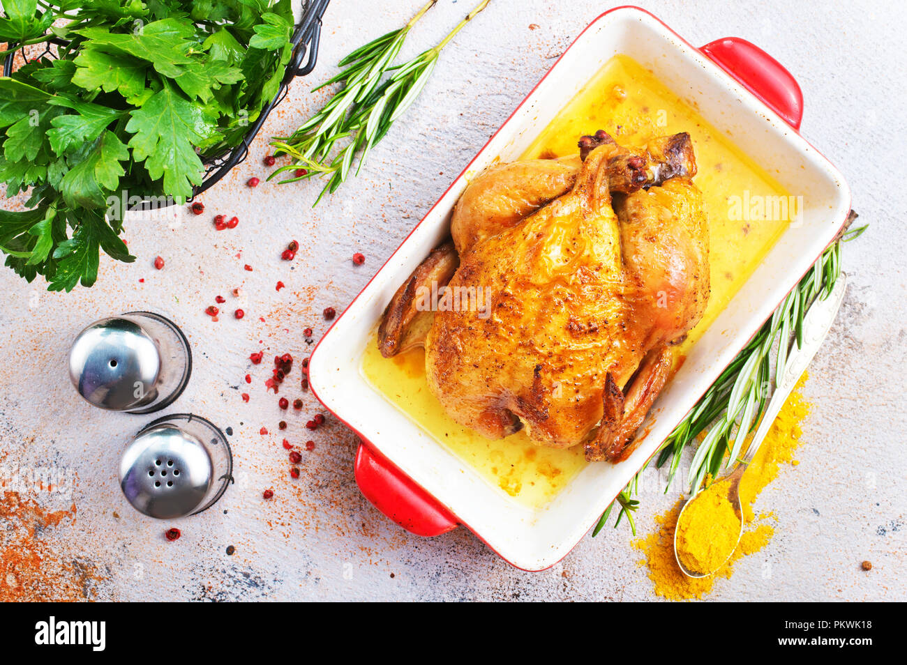 baked chicken in bowl on a table Stock Photo - Alamy