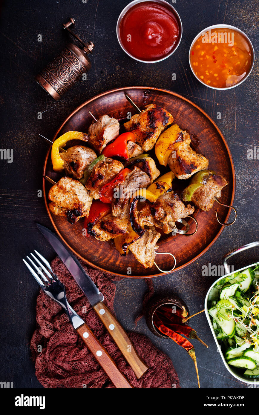 meat kebab with vegetables on plate, fresh kebab with sauce Stock Photo ...