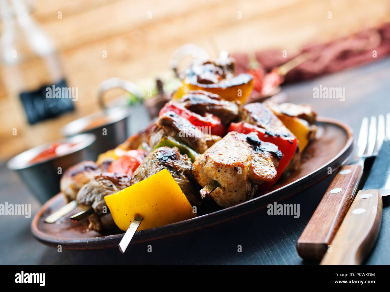 meat kebab with vegetables on plate, fresh kebab with sauce Stock Photo ...