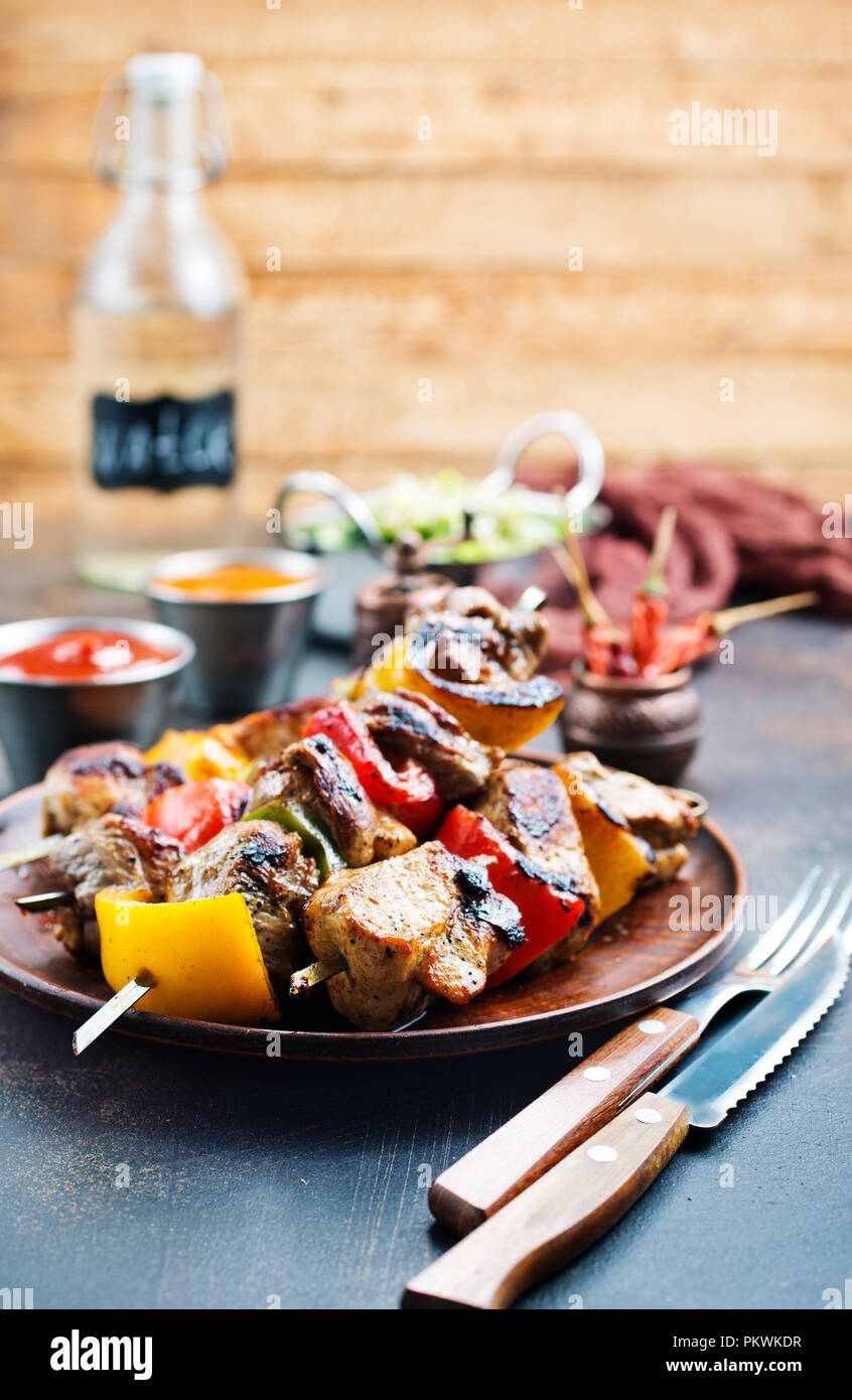 meat kebab with vegetables on plate, fresh kebab with sauce Stock Photo ...