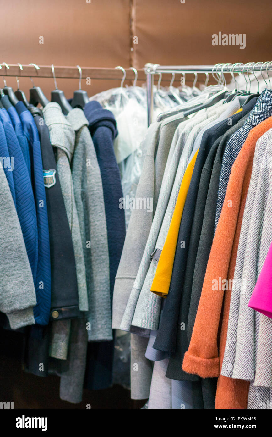 Fashionable clothes in a boutique store. Women clothing store Stock ...