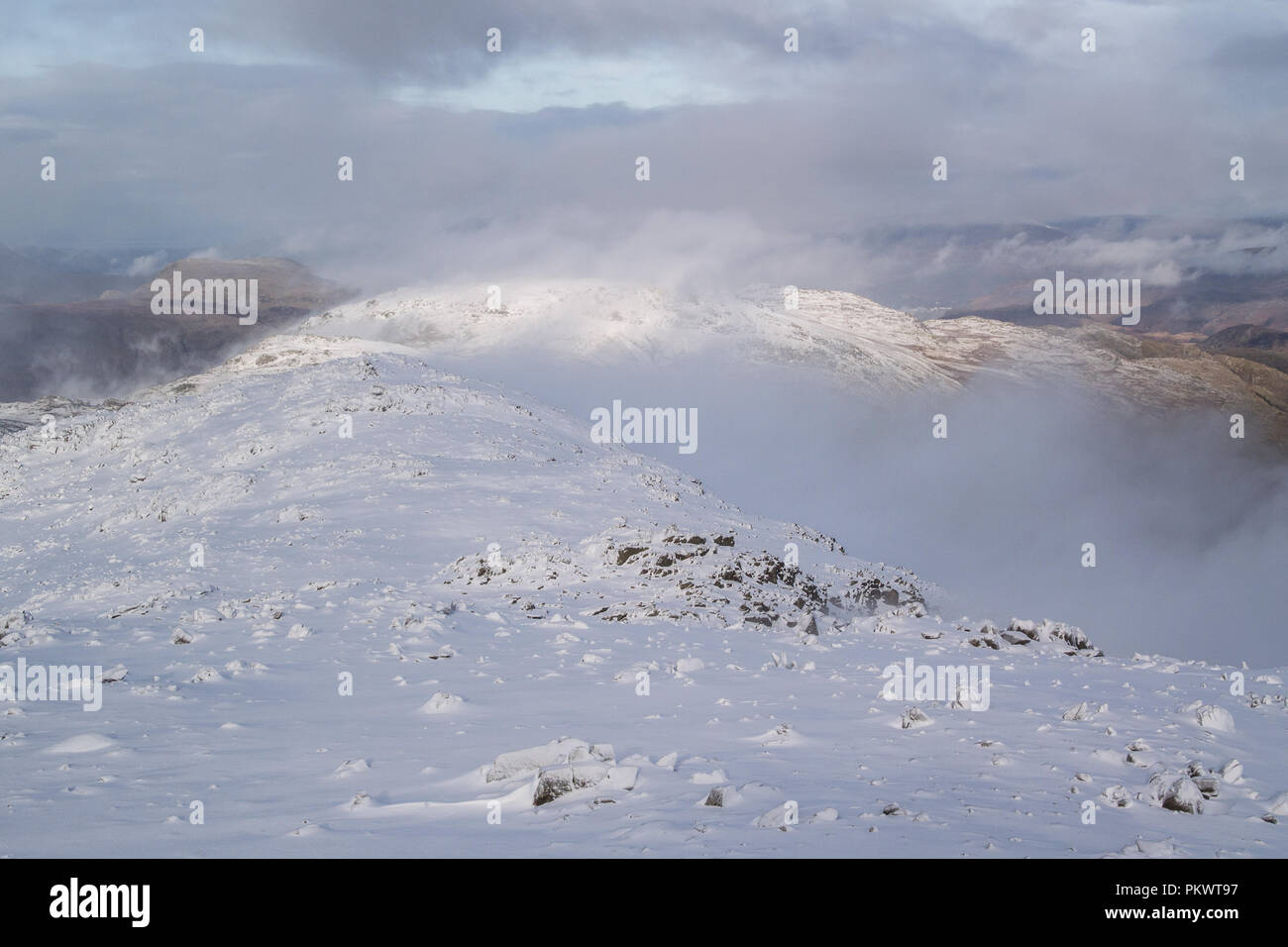 Summit ridge of Bowfell, English Lake District. Winter view with full ...