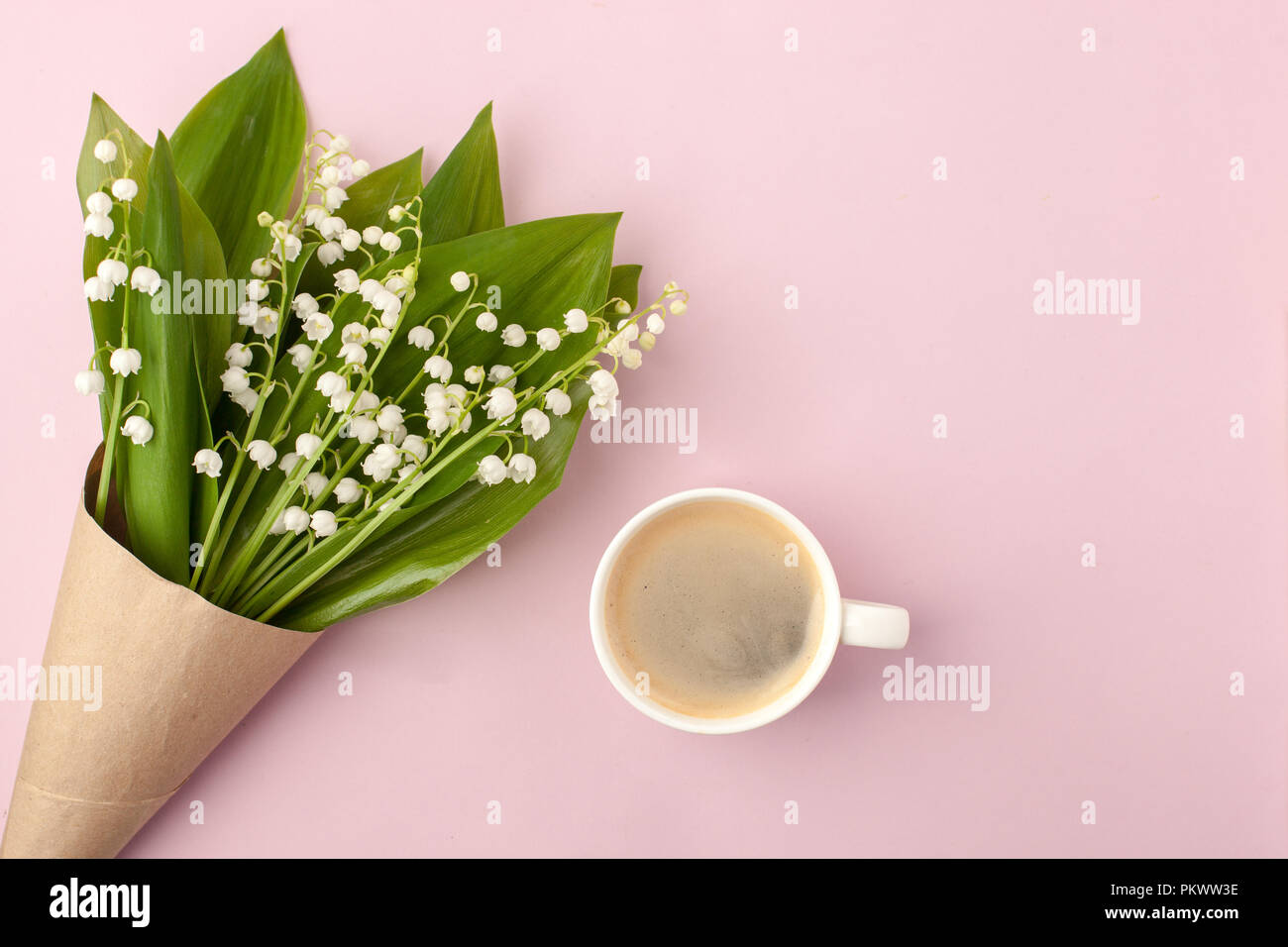Coffee mug with bouquet of flowers lily of the valley pink pastel ...