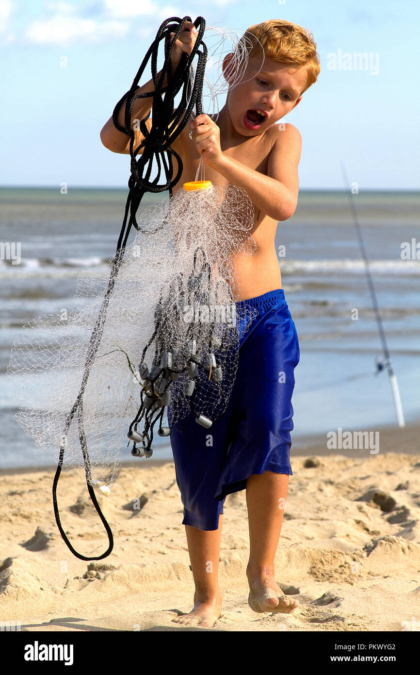 Boy fish net hi-res stock photography and images - Alamy