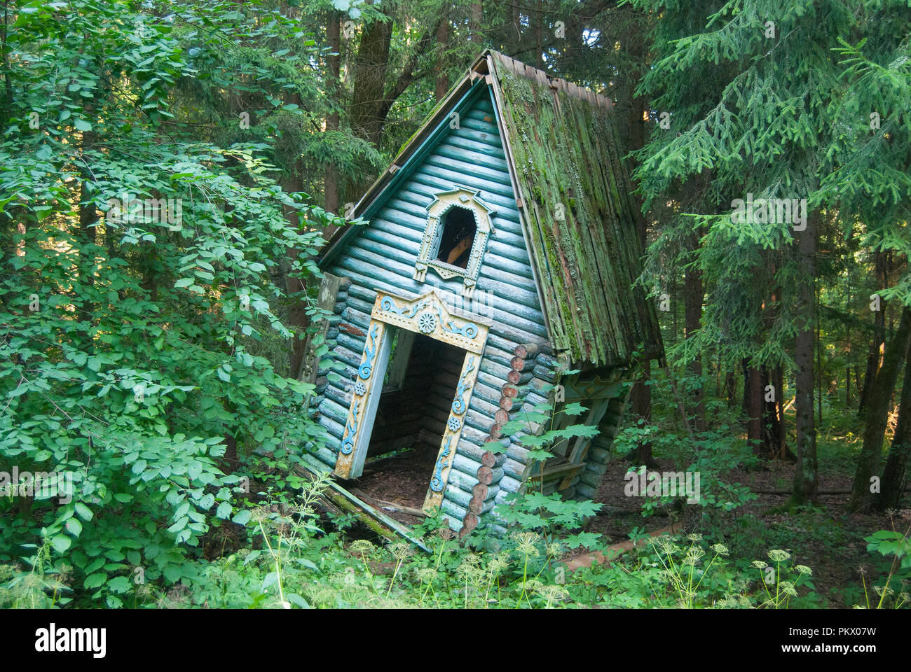 An old abandoned children's playhouse in the forest Stock Photo - Alamy
