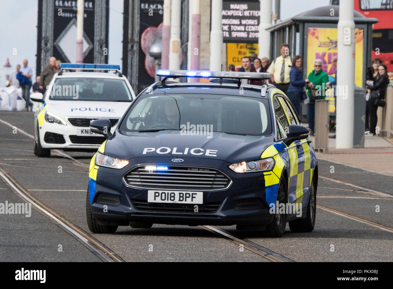 999 Emergency Police Responders; Vehicles using sirens and blue lights ...
