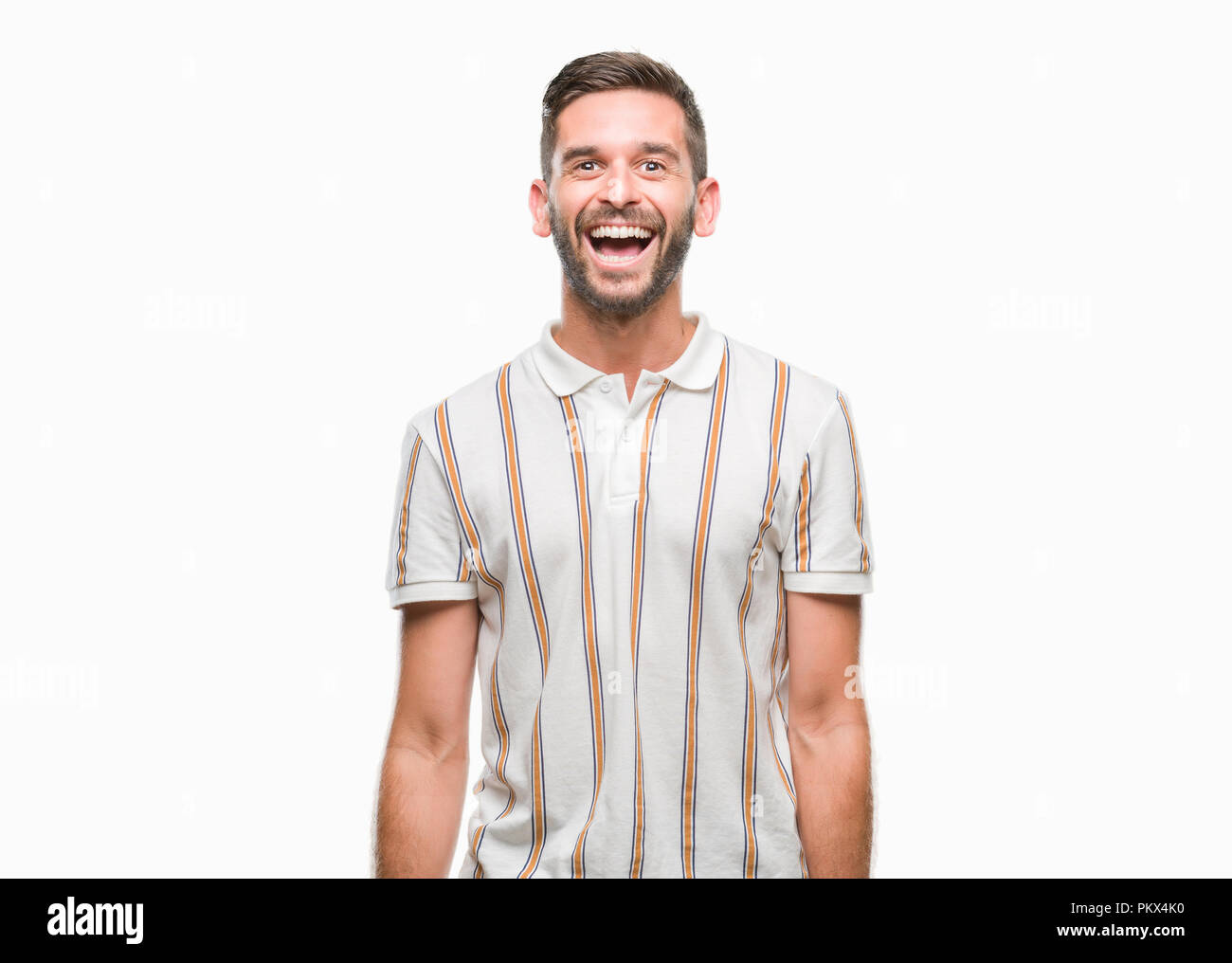 Young handsome man over isolated background with a happy and cool smile ...