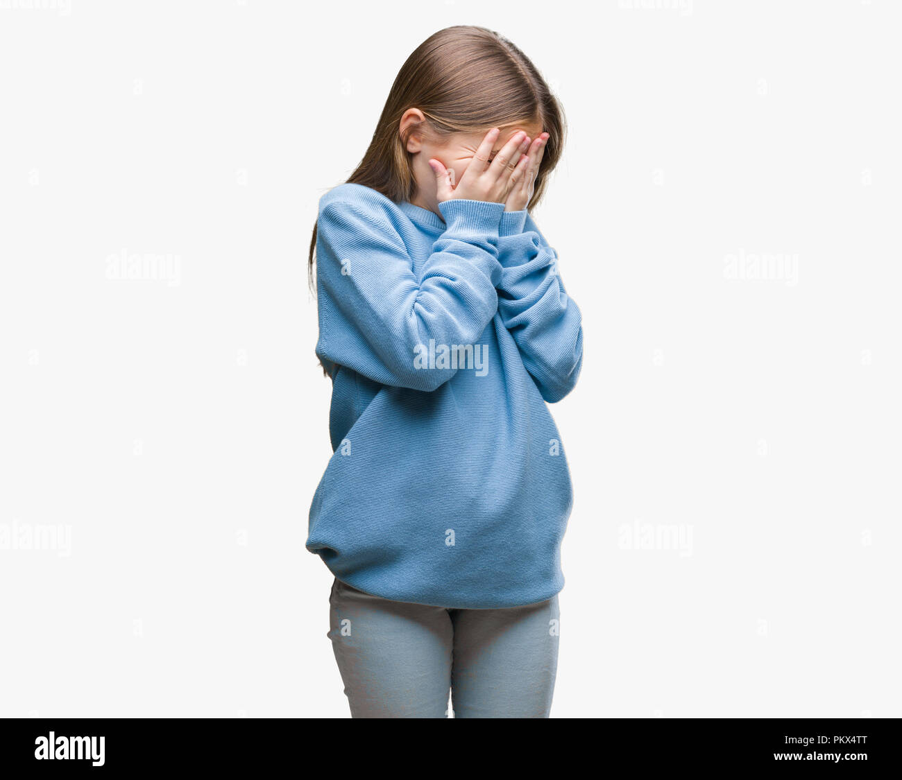 Young beautiful girl wearing winter sweater over isolated background ...