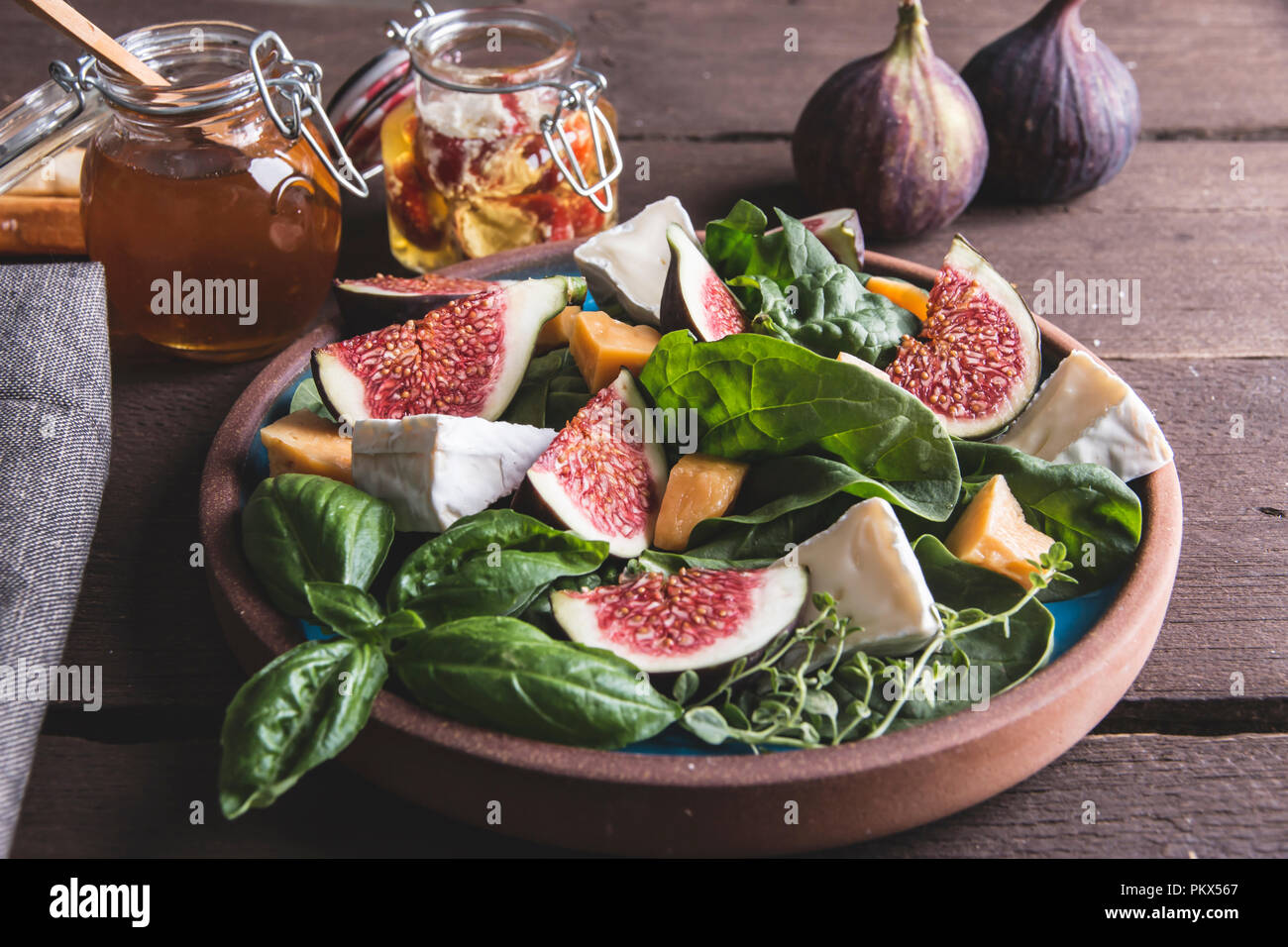 salad with green, figs, cheese vegetarian dish Stock Photo - Alamy