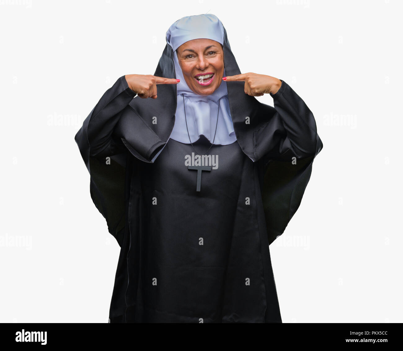 Middle Age Senior Christian Catholic Nun Woman Over Isolated Background Smiling Confident